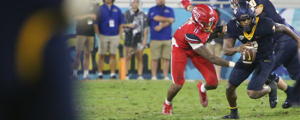 NCAA Football RoofClaim.com Boca Raton Bowl: Toledo holds off Liberty ...